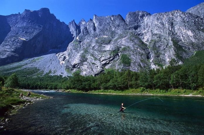 Take An Unforgettable Trip To The Iconic Troll Wall In Norway - Journey ...
